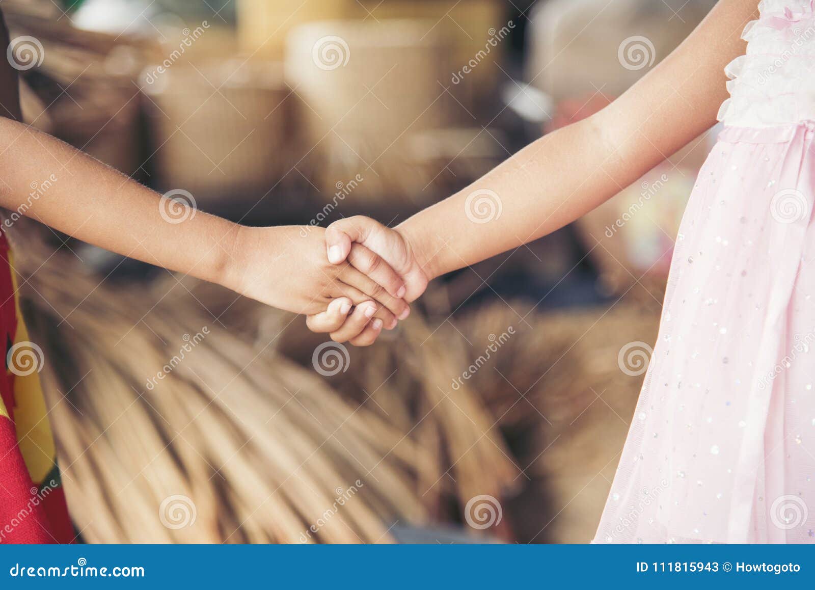 Adorable Kids Shaking Hands Together Royalty-Free Stock Photo ...