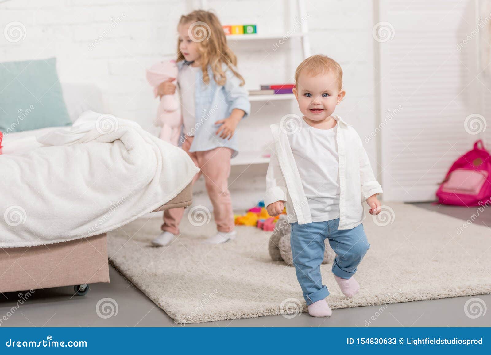 Adorable kids standing stock image. Image of toys, sisters - 154830633