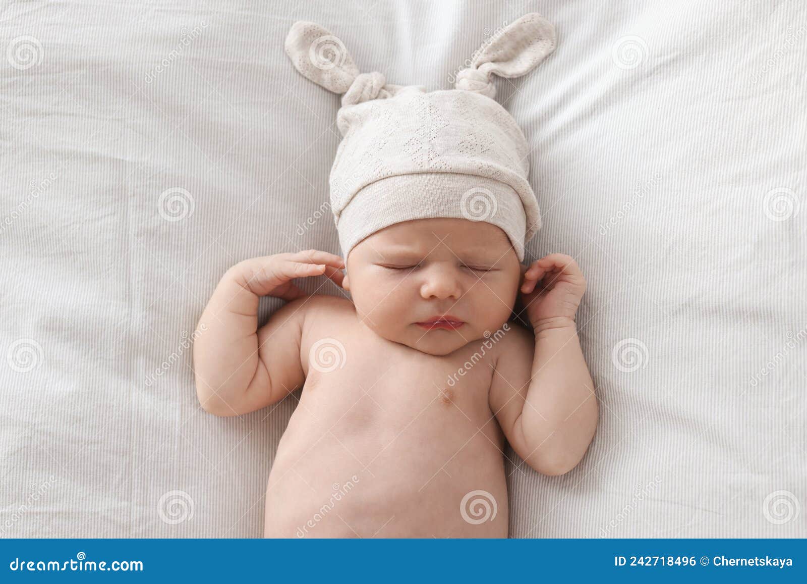 Adorable Little Baby with Hat Sleeping on Bed Stock Photo - Image of ...