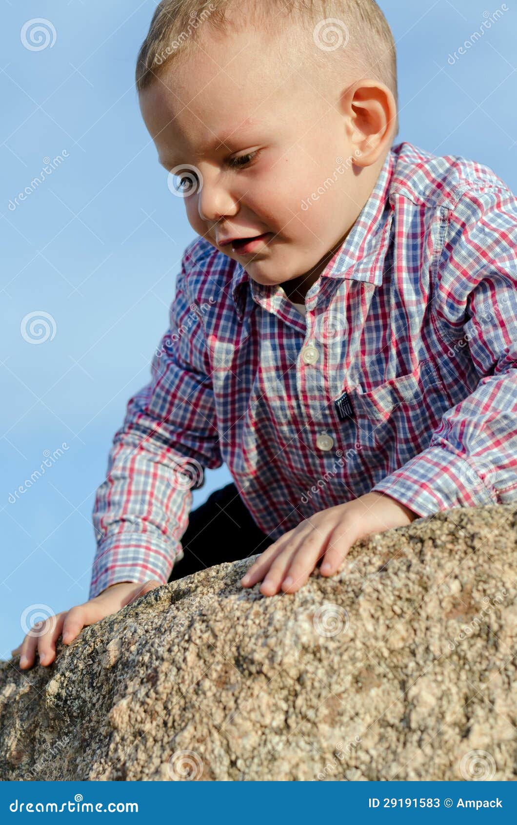 Adorable Little Boy Climbing a Rock Stock Image - Image of childhood ...