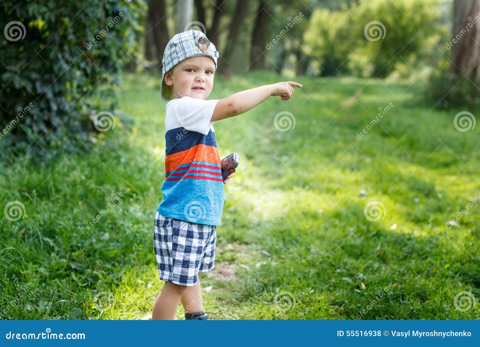 Adorable Little Boy Pointing at Something Stock Photo - Image of ...