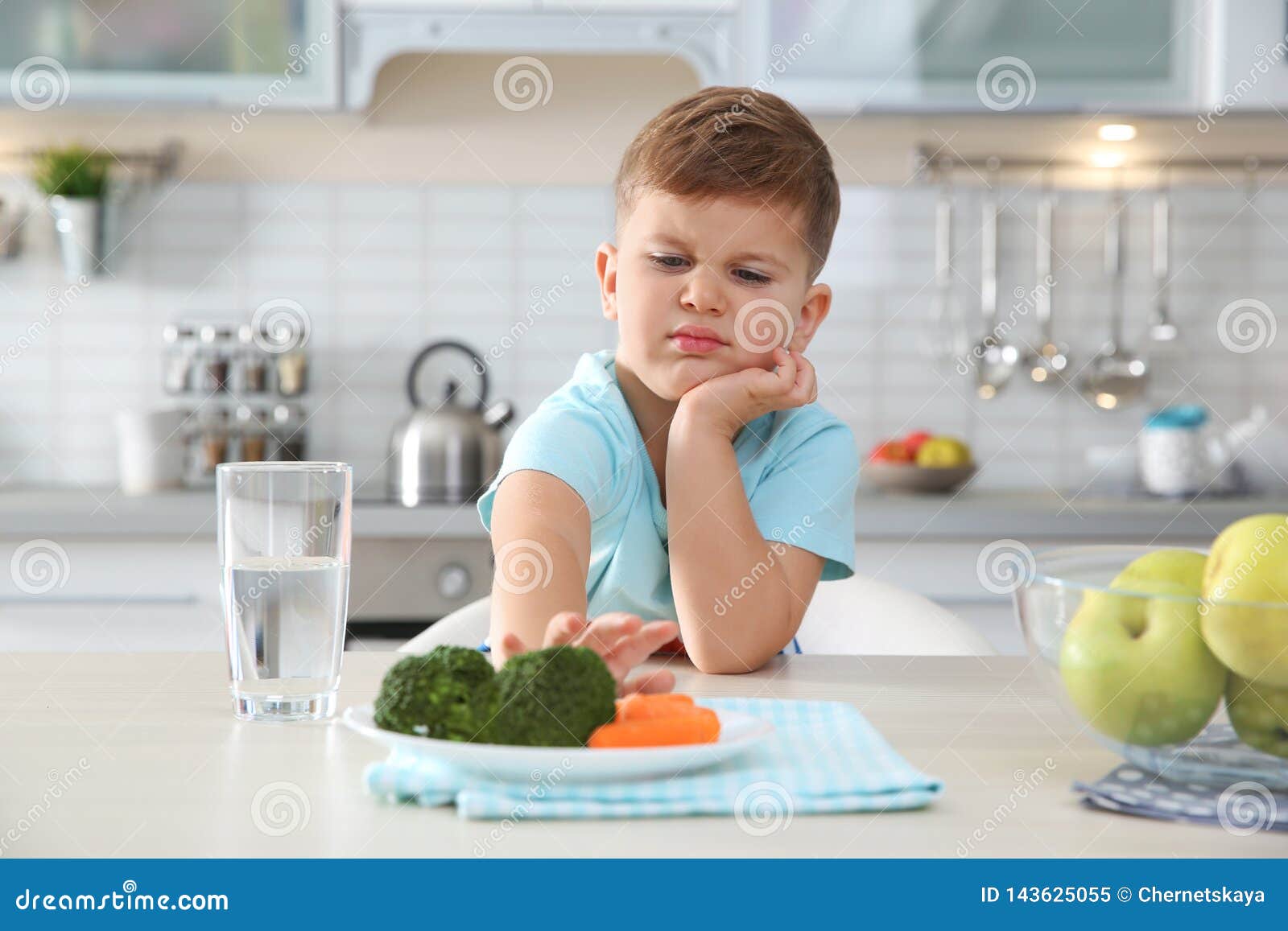 Adorable Little Boy Refusing To Eat Vegetables at Table Stock Image ...