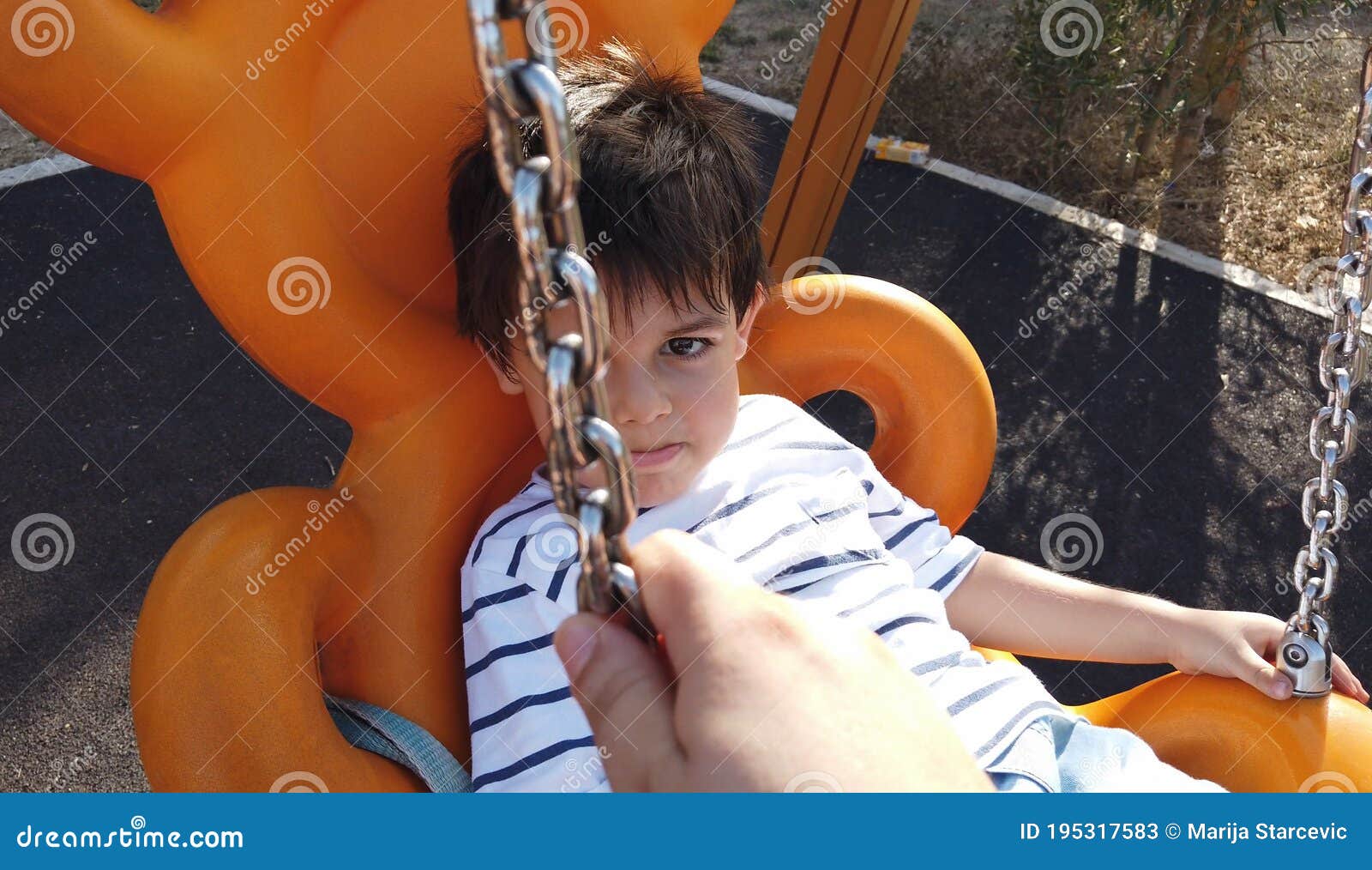Adorable Little Boy on a Swing with Grumpy Face Stock Image - Image of ...