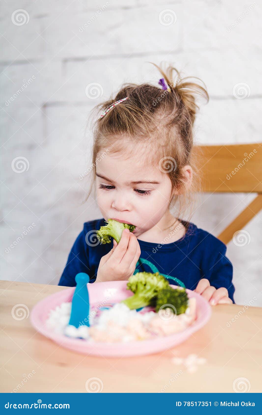 Adorable Little Girl Eating Lunch Stock Image - Image of feed, blond ...