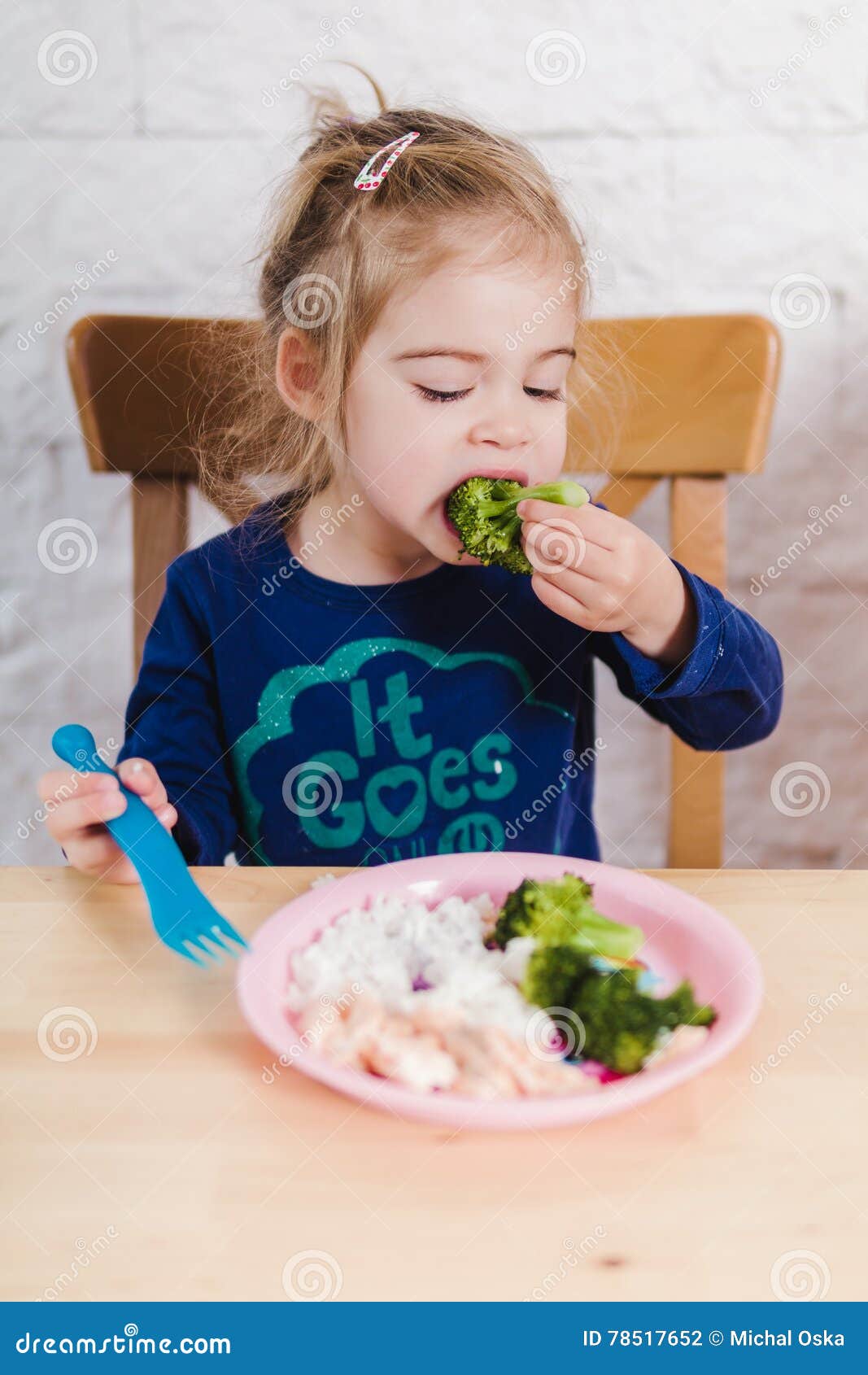 Adorable Little Girl Eating Lunch Stock Photo - Image of laugh, girl ...