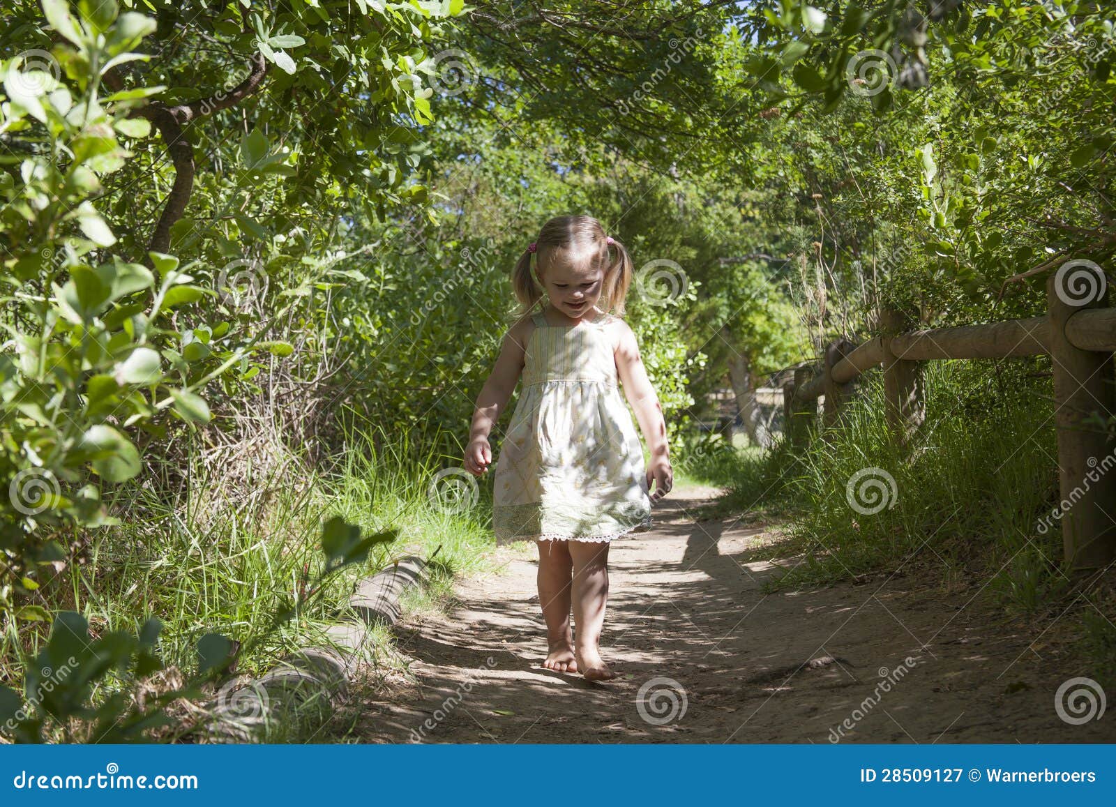Adorable Little Girl Walking Down Path Stock Image - Image of hair ...