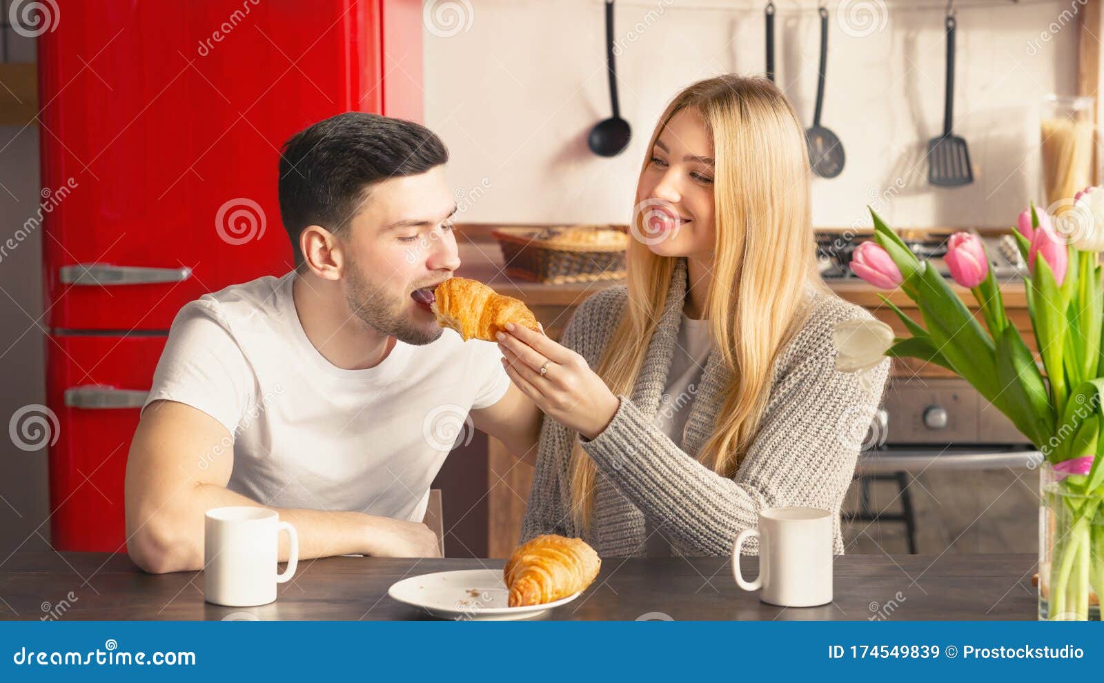Adorable Loving Couple Sharing Breakfast Together in Kitchen Stock ...
