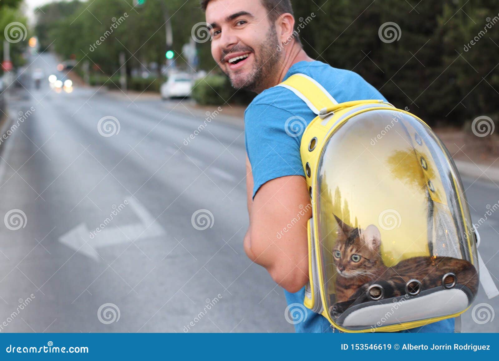 Adorable Man Carrying His Cat in Bubble Style Backpack Stock Image ...