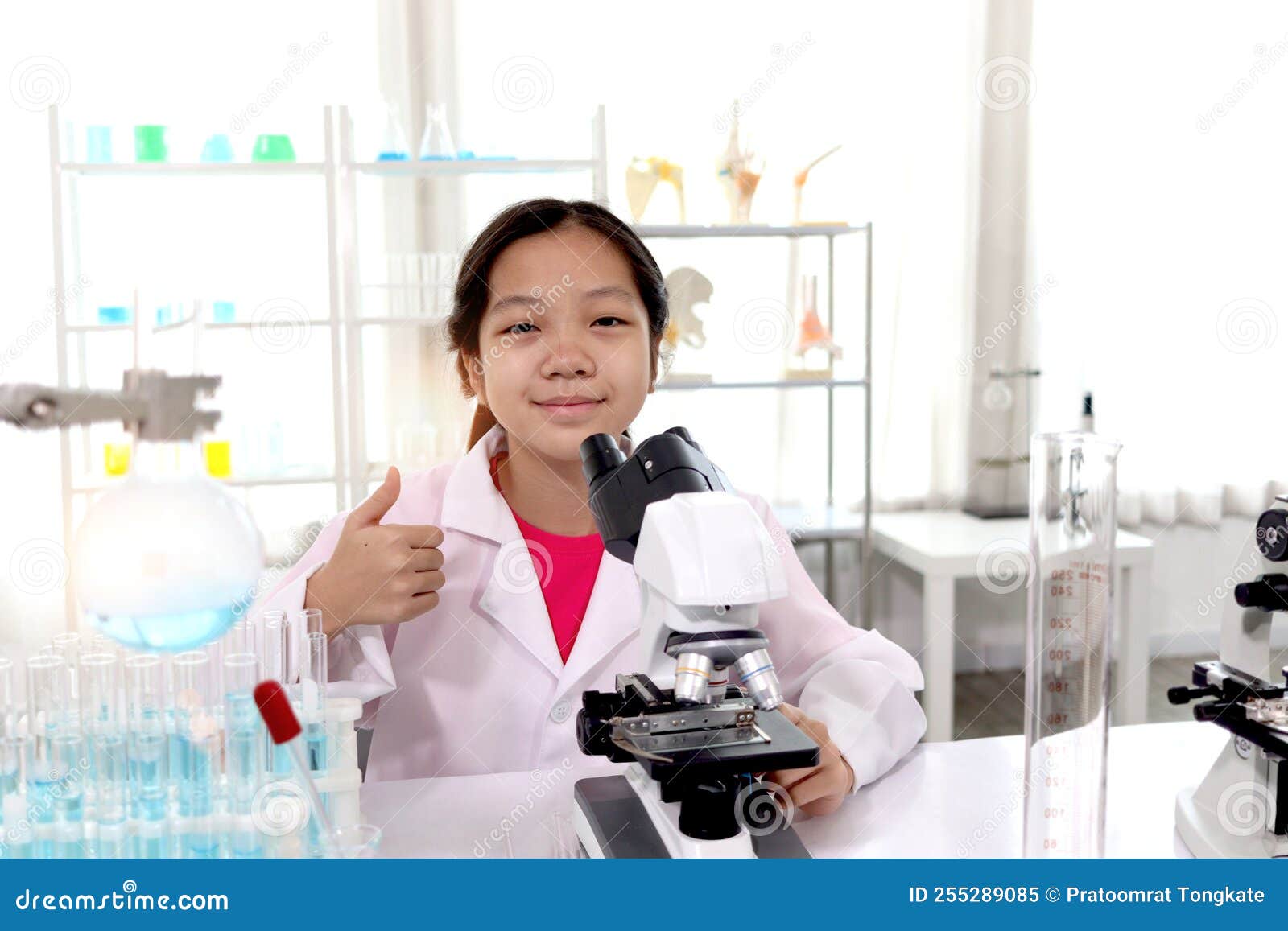 Adorable Schoolgirl in Lab Coat Doing Science Experiments, Young ...