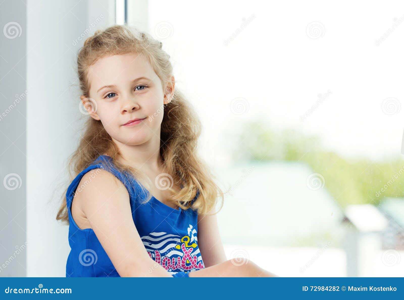 Adorable Smiling Little Girl by the Window Stock Photo - Image of ...