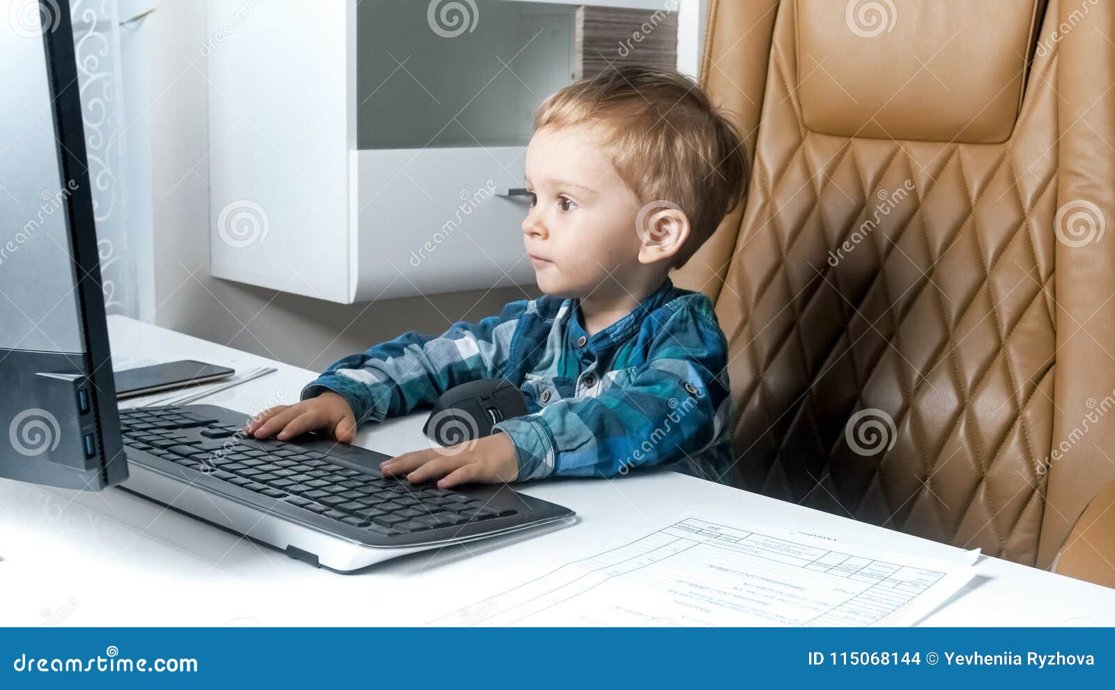 Portrait of Adorable Toddler Boy Using Computer in Office Stock Photo ...