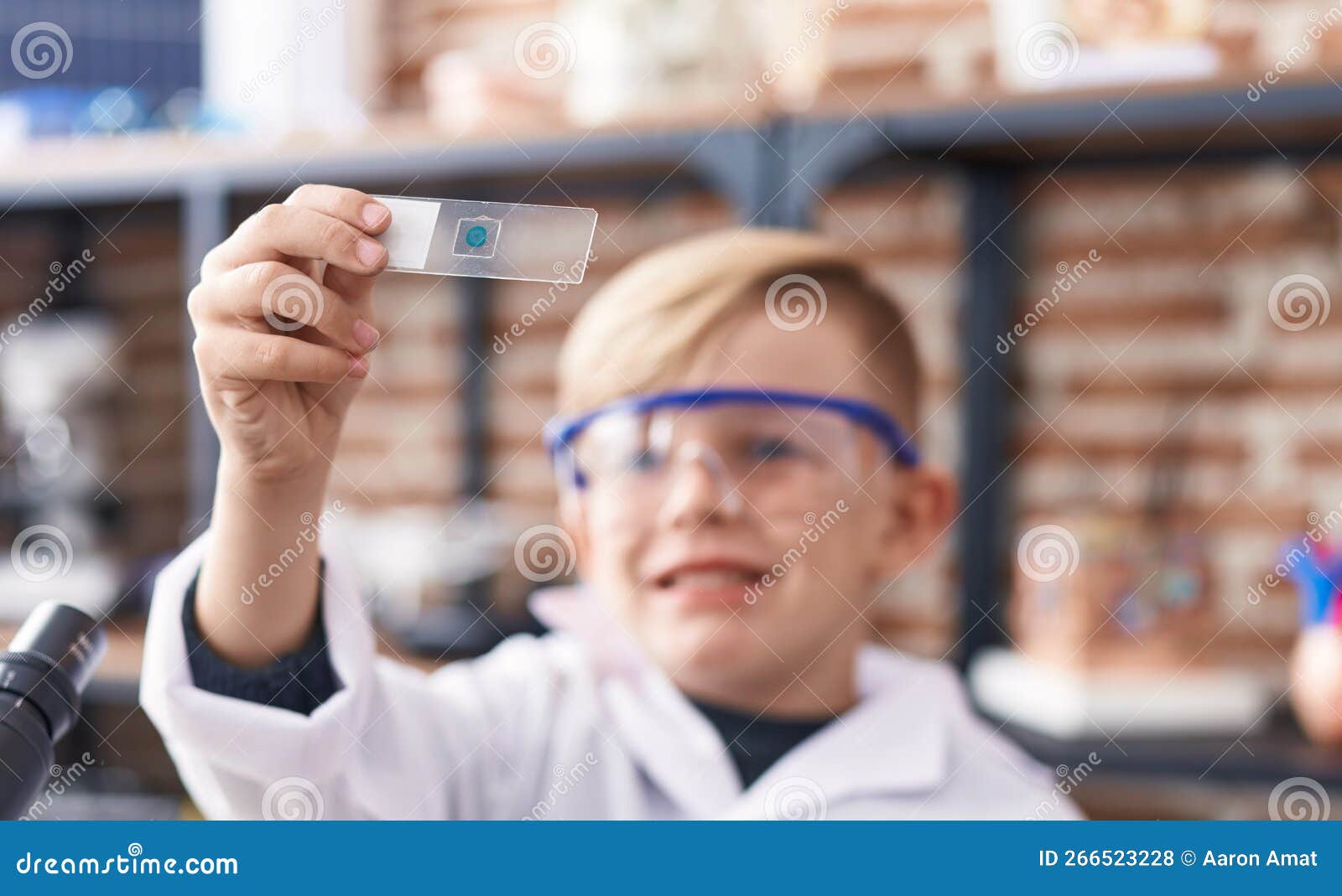 Adorable Toddler Scientist Smiling Confident Looking Sample at ...
