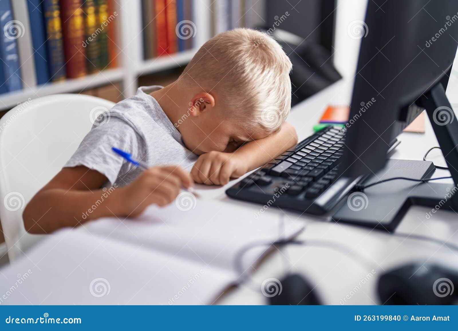 Adorable Toddler Student Stressed Using Computer Sitting on Table at ...