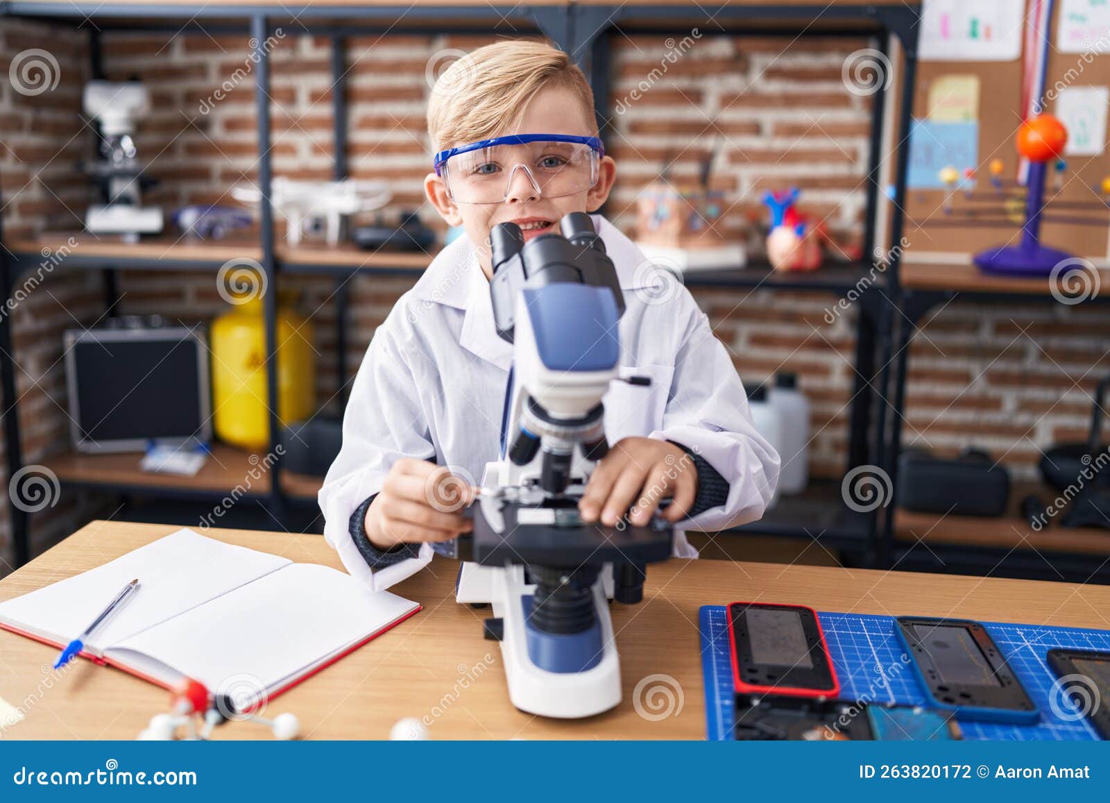 Adorable Toddler Student Using Microscope Standing at Classroom Stock ...