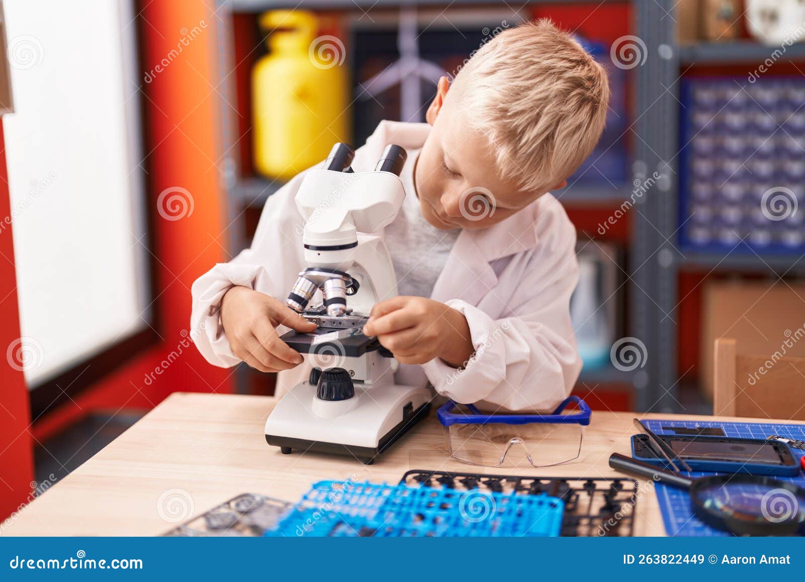 Adorable Toddler Student Using Microscope Standing at Classroom Stock ...