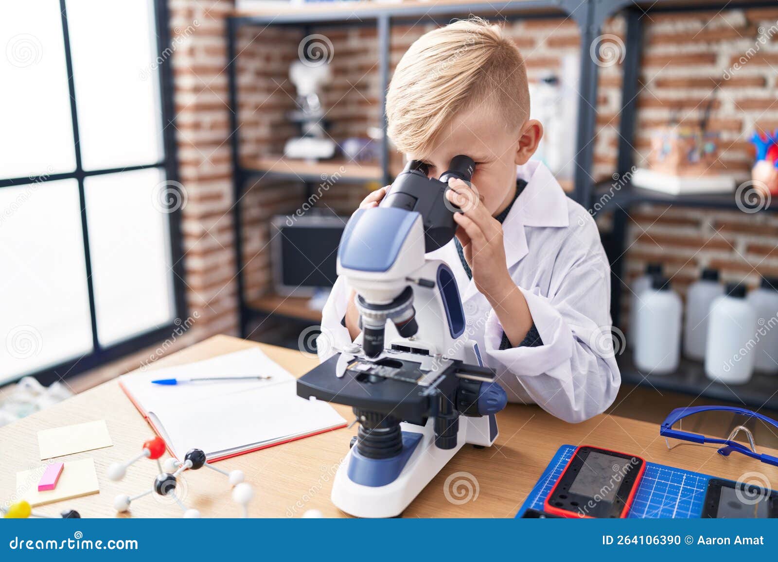 Adorable Toddler Student Using Microscope Standing at Classroom Stock ...
