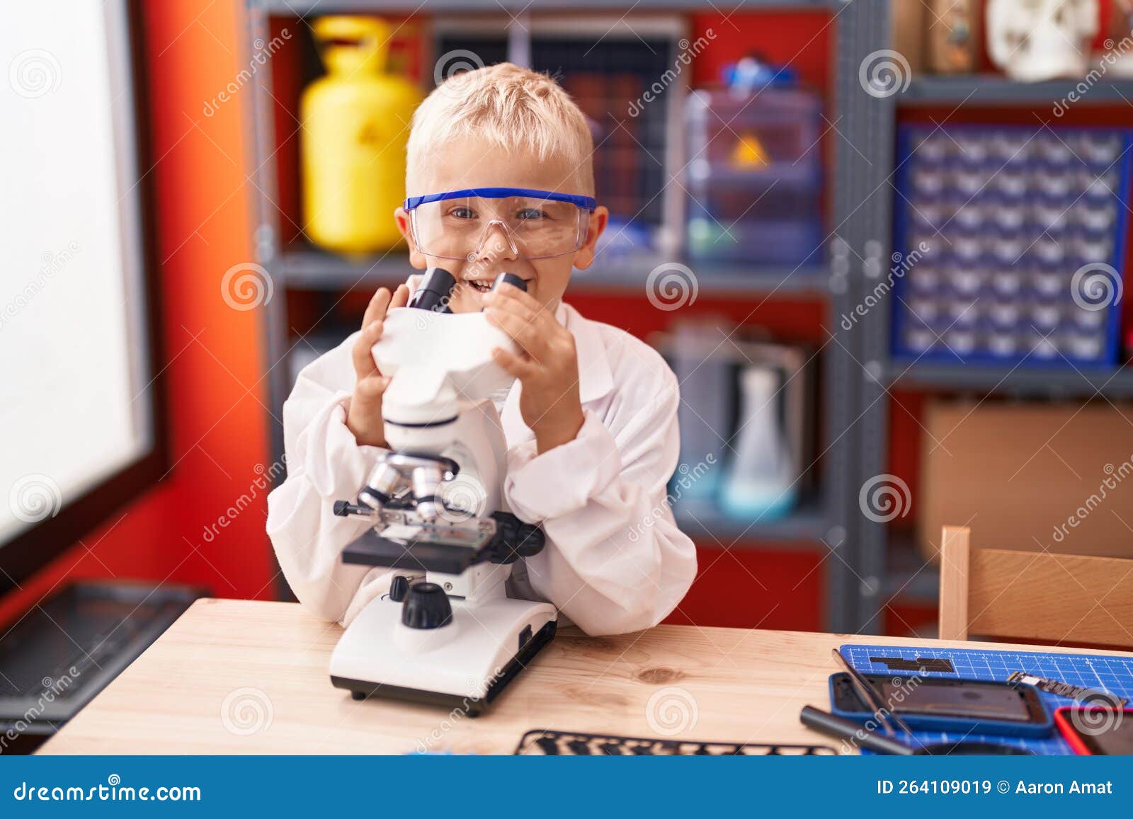 Adorable Toddler Student Using Microscope Standing at Classroom Stock ...