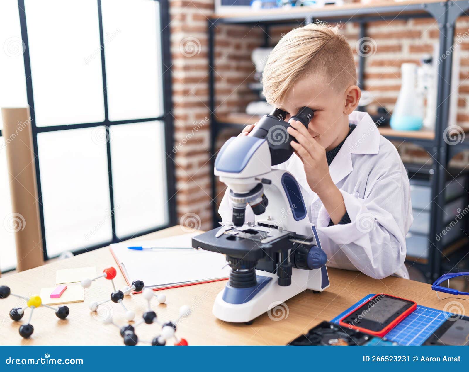 Adorable Toddler Student Using Microscope Standing at Classroom Stock ...