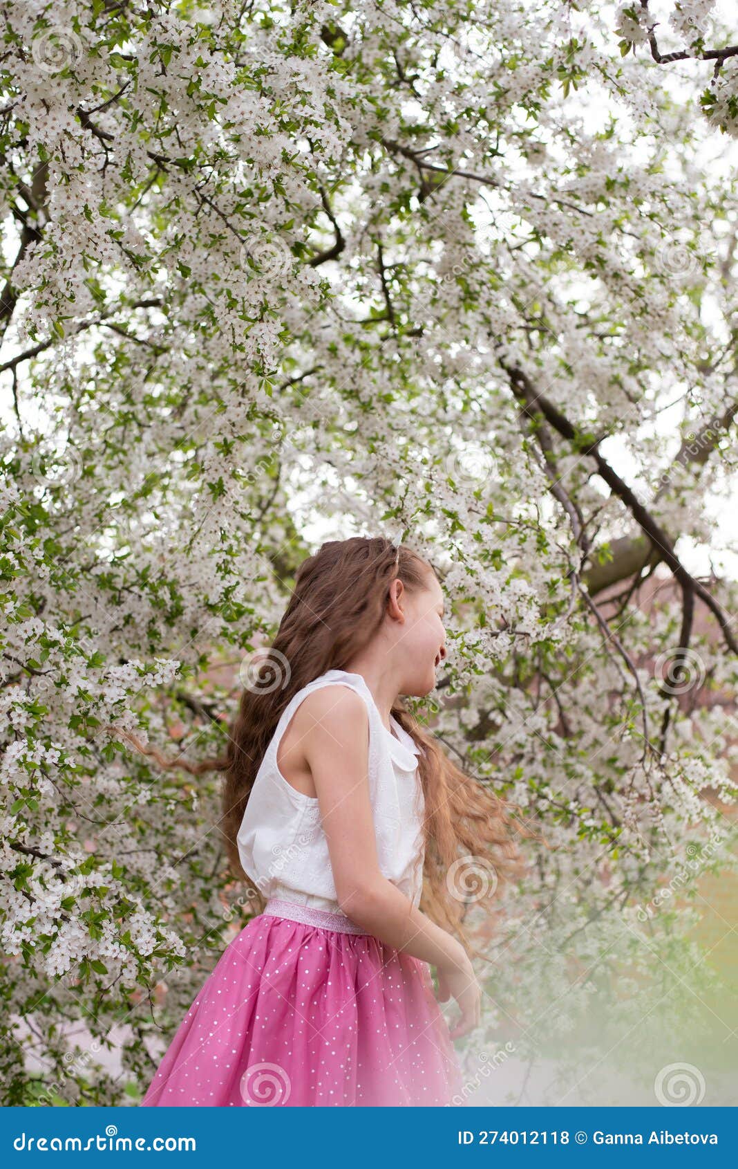 Adorable 9 Years Old Girl With Long Curly Hair Surrounded By Plenty