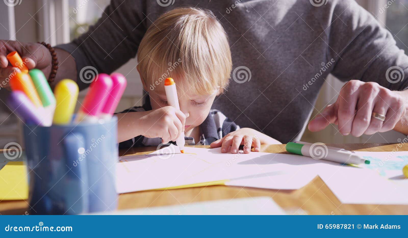 Adorable Young Boy Writing with His Father Stock Image - Image of ...