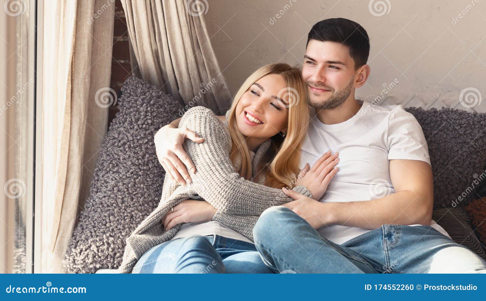 Lovely Young Couple Cuddling on Sofa at Home Stock Photo - Image of ... Lovely Young Couple Cuddling on Sofa at Home Stock Photo - Image of ...