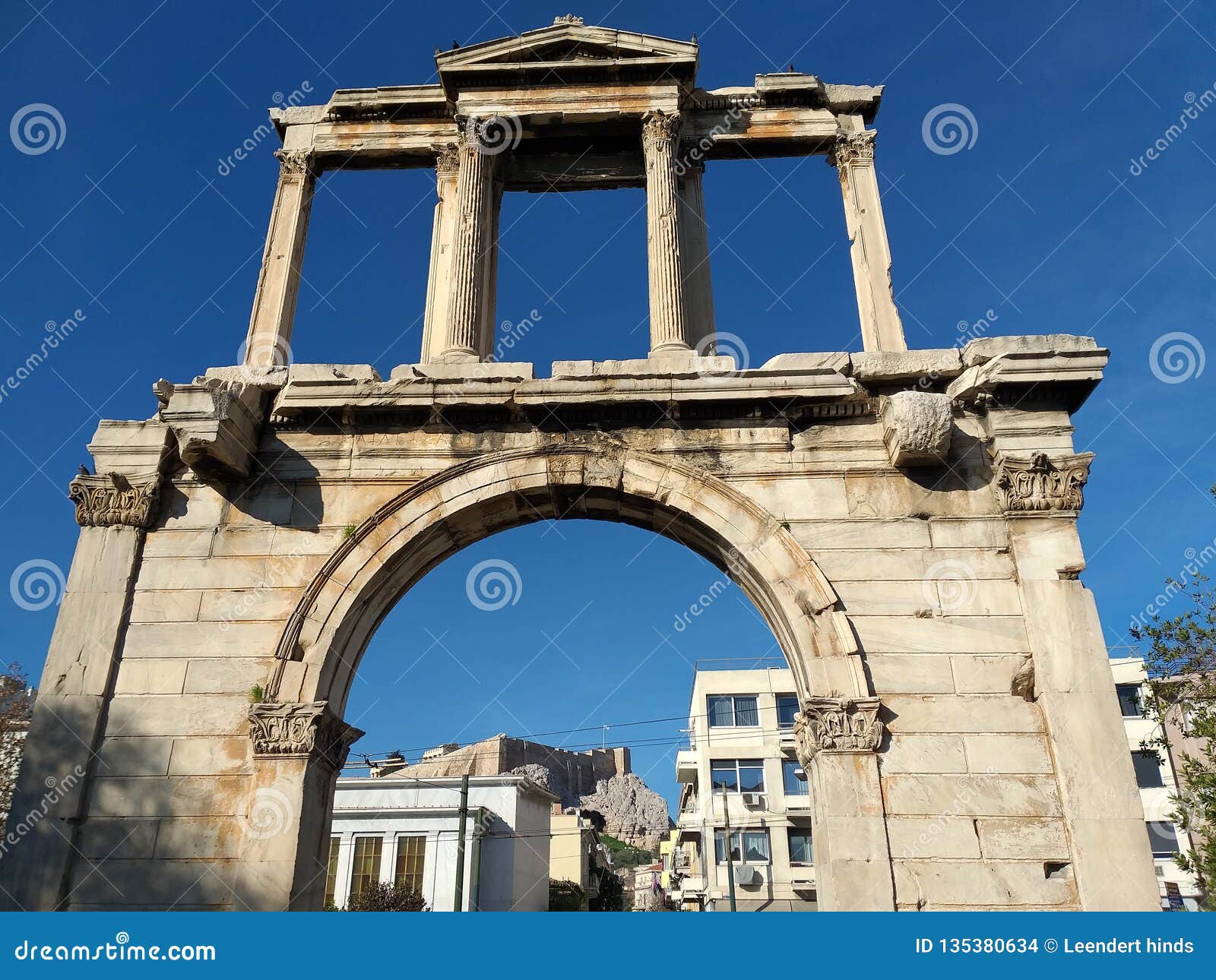 Adrianus Gate with Akropolos at the Background Stock Photo - Image of ...