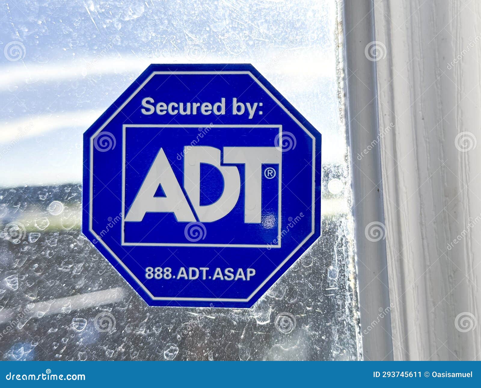 An ADT Security Sign on a Window Editorial Photo - Image of password ...