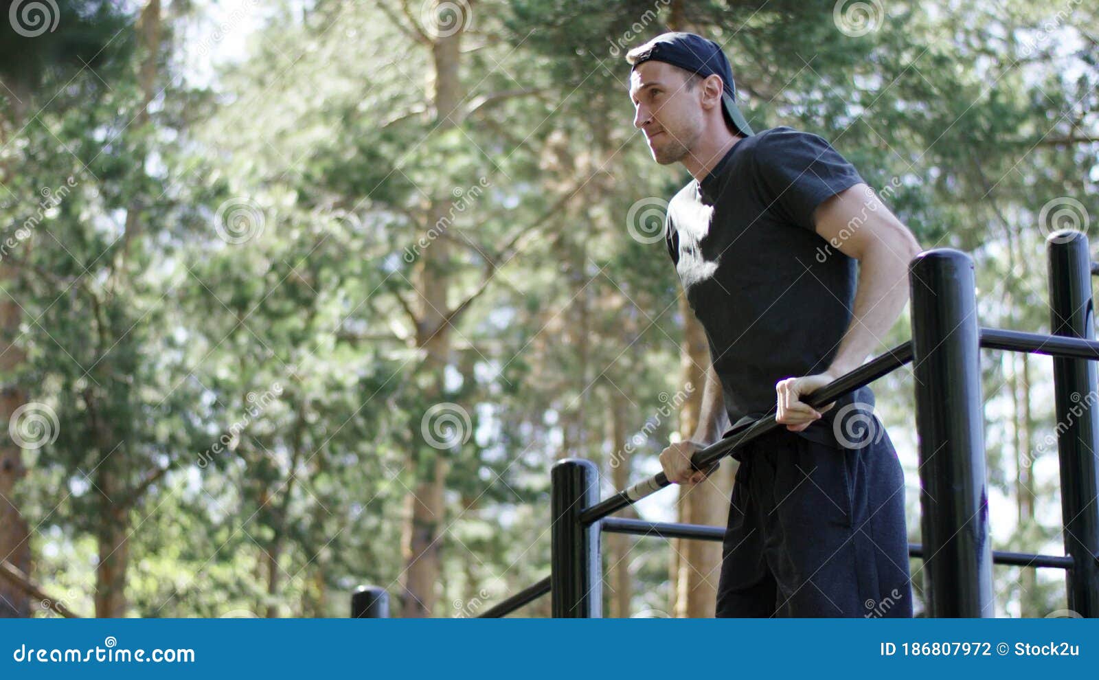 Adult Caucasian Athlete is Doing the Ejection Pull Exercise on a ...