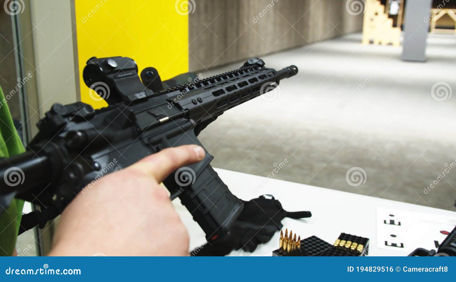 Adult Loading an Assault Rifle at a Shooting Range. Stock Photo - Image ...