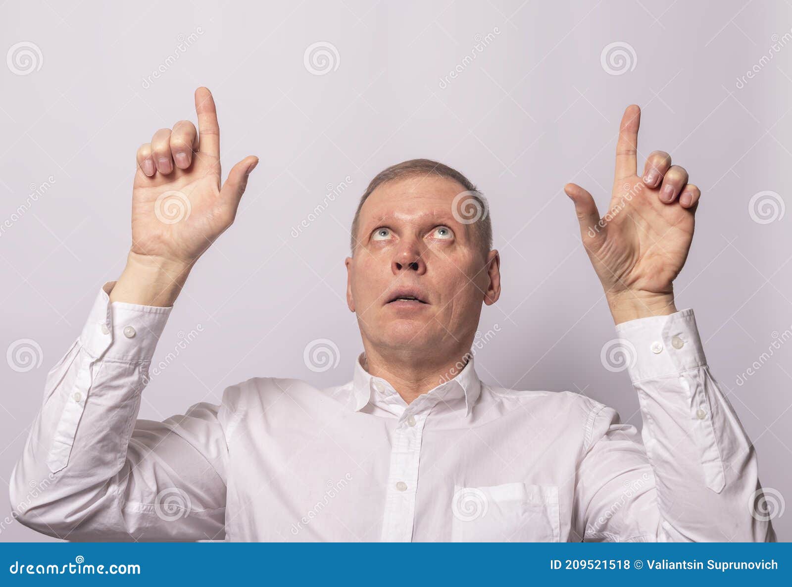 Adult Man Looking and Pointing Up with Both Fingers Stock Photo - Image ...