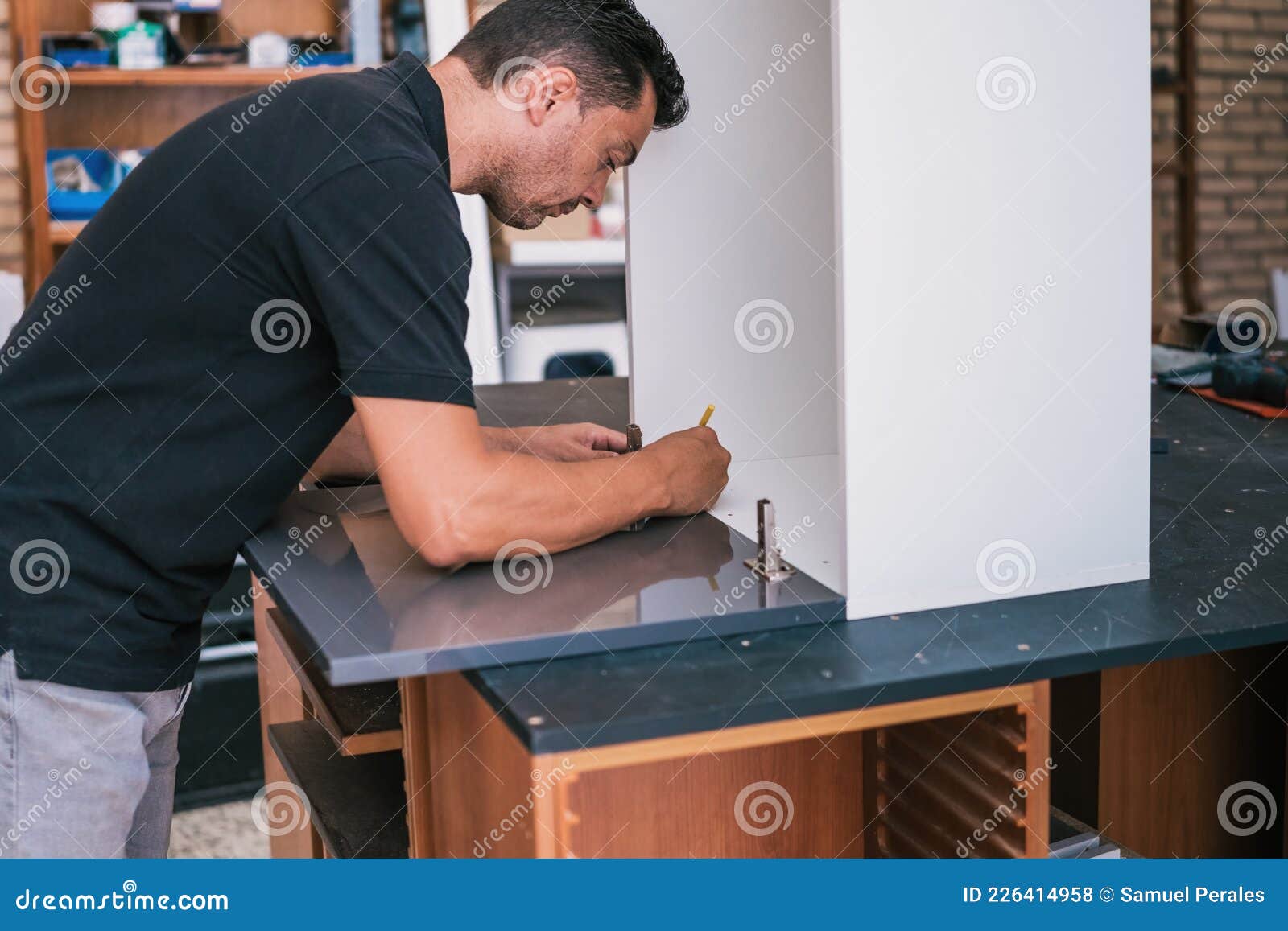 Man Marking the Surface of a Kitchen that are Constructing Stock Photo ...