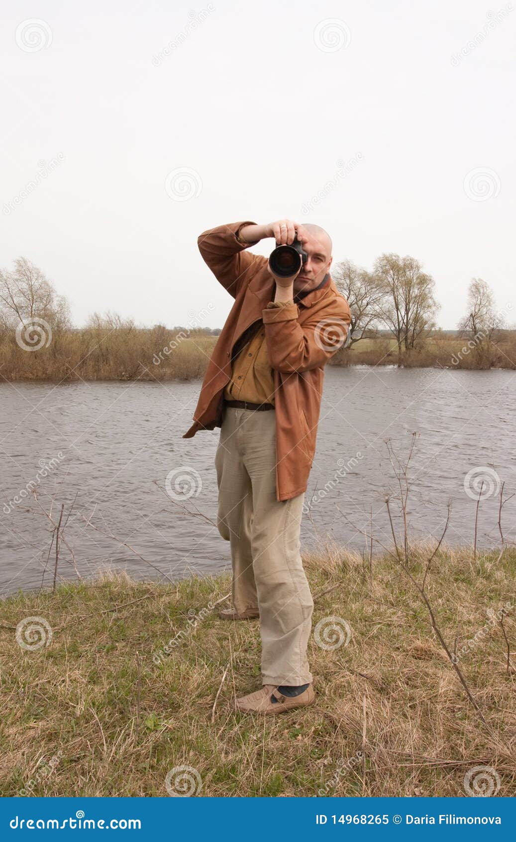 Adult men with camera stock image. Image of photographer - 14968265