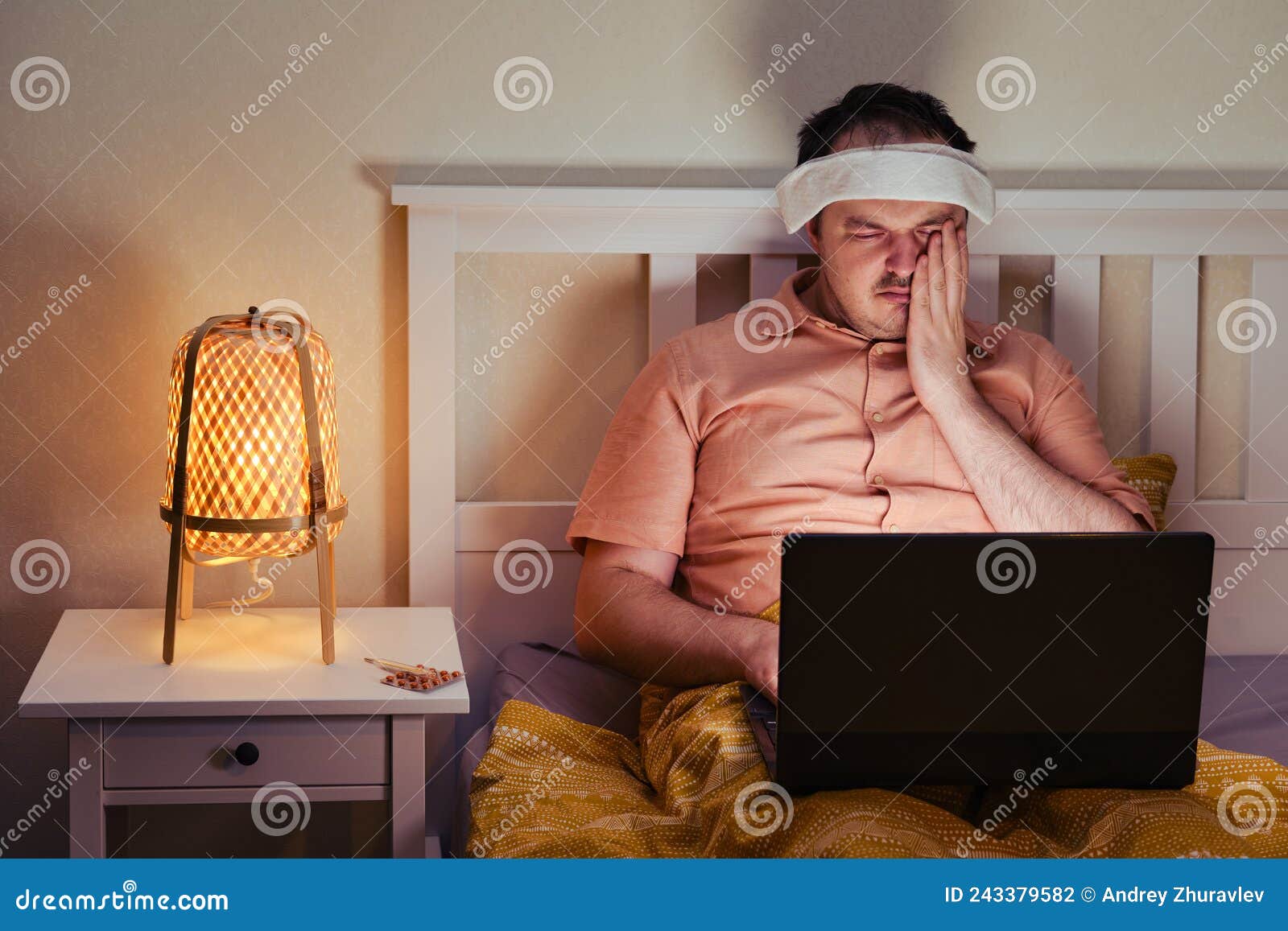 Adult Sick Man Crying Holding His Sore Head while Lying on Bed with ...
