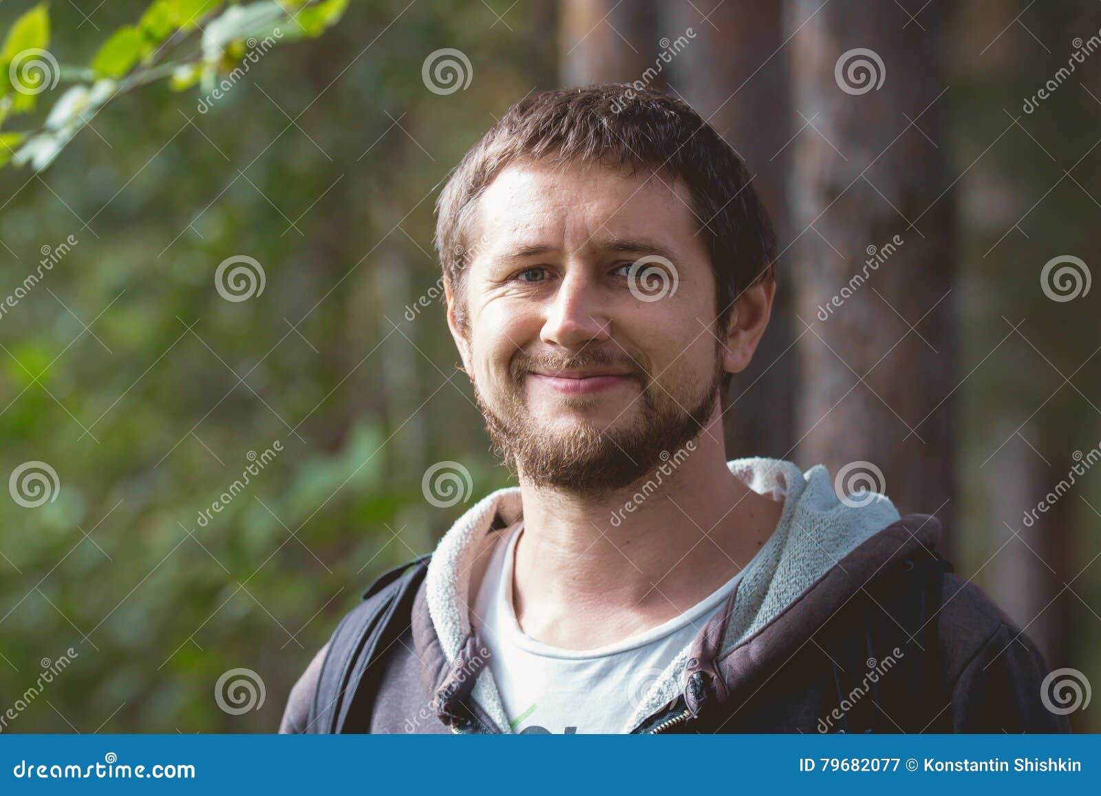 Adult Strong Man with Beard Smiling in Forest Stock Image - Image of ...