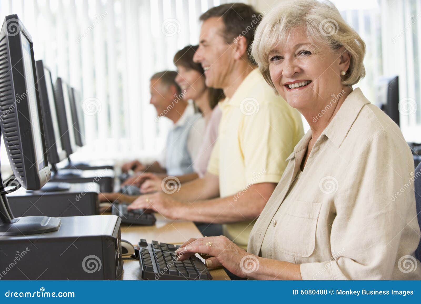 Adult Students on a Computer Stock Photo - Image of fifties, looking ...
