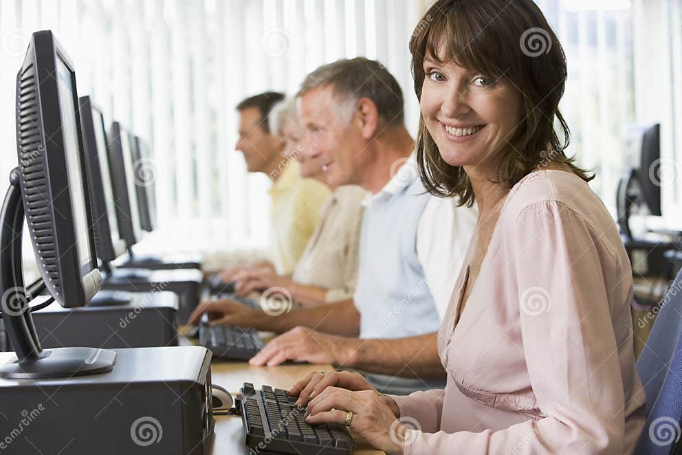 Adult Students on a Computer Stock Image - Image of aged, color: 6080501