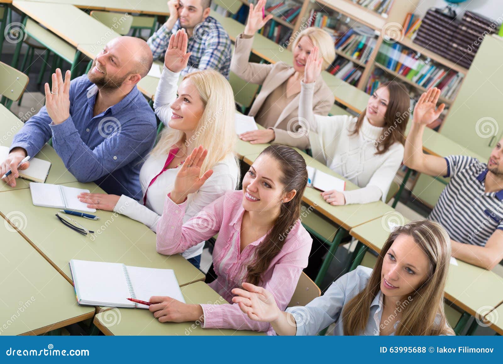 Adult Students with Hands Up at Class Stock Photo - Image of people ...