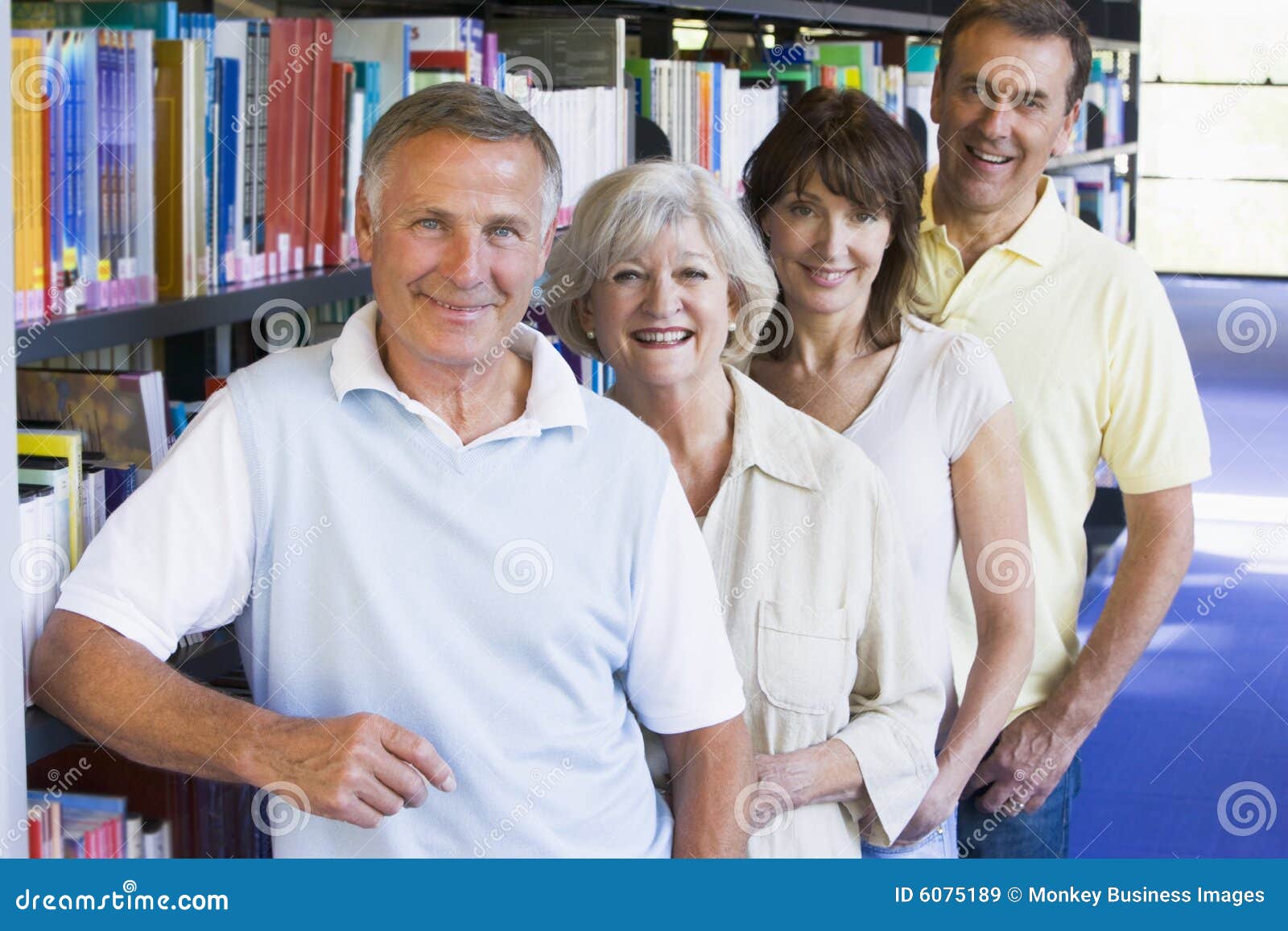 Adult Students Standing in a Library Stock Image - Image of people ...
