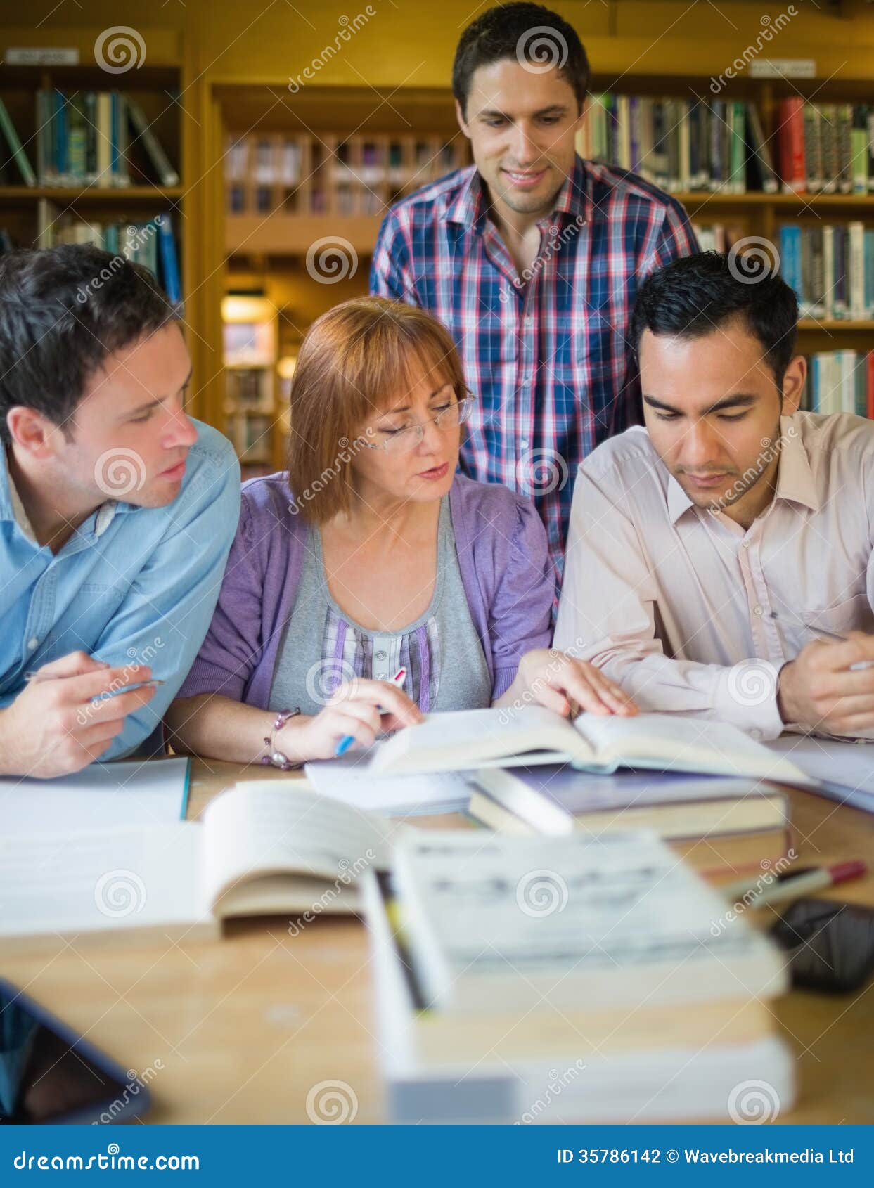 Adult Students Studying Together in the Library Stock Photo - Image of ...