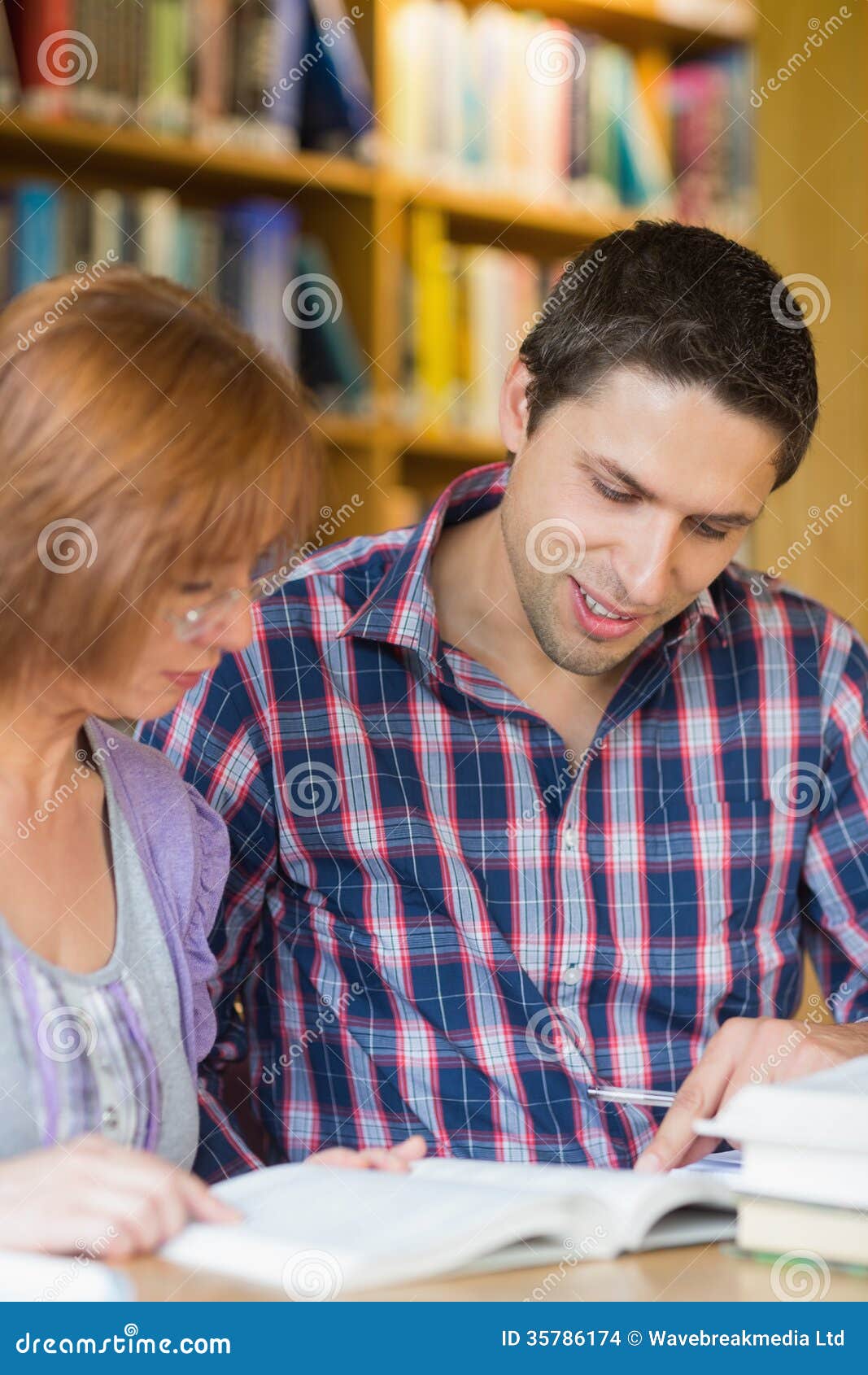 Adult Students Studying Together in the Library Stock Photo - Image of ...