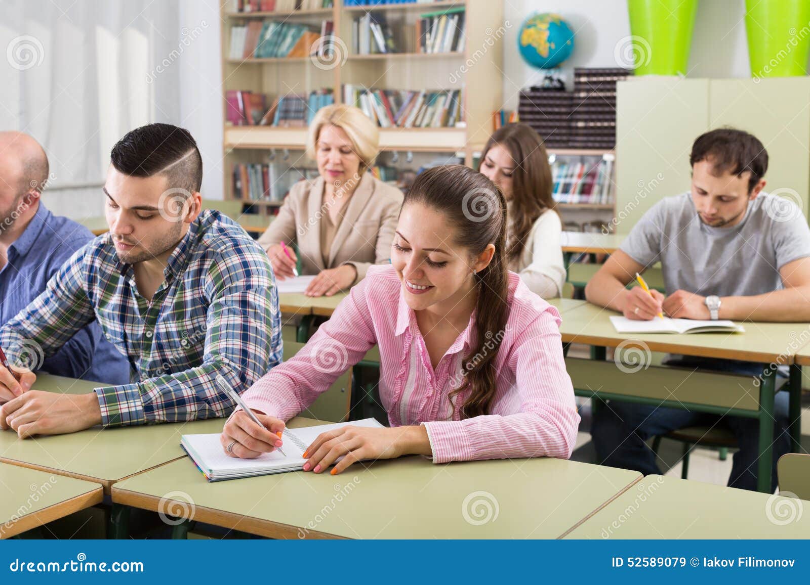 Adult Students Writing in Classroom Stock Image - Image of extension ...