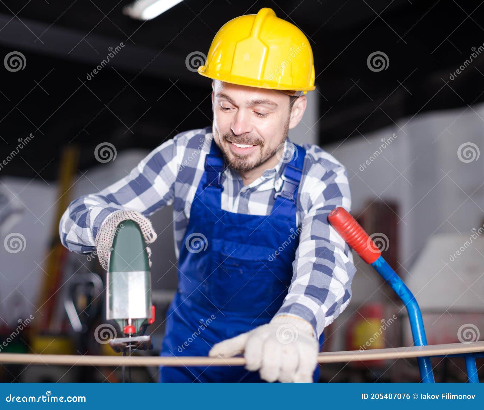 Adult is Using Power Jigsaw for Construction Work Stock Photo - Image ...