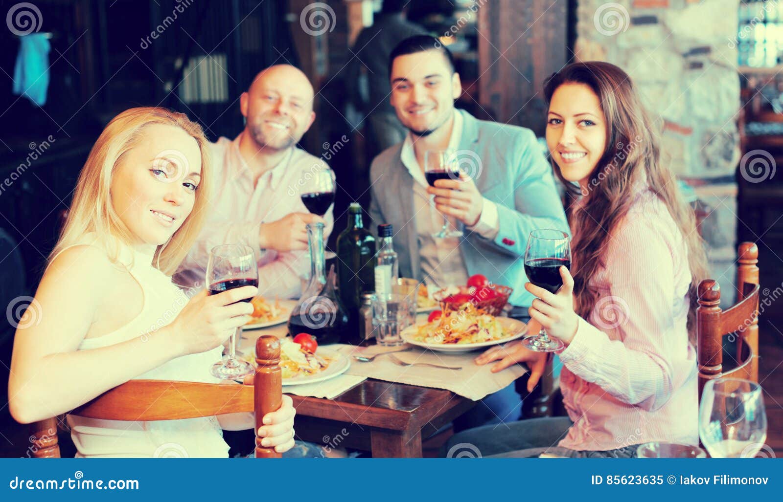 Adults Having Dinner in Restaurant Stock Image - Image of glasses ...