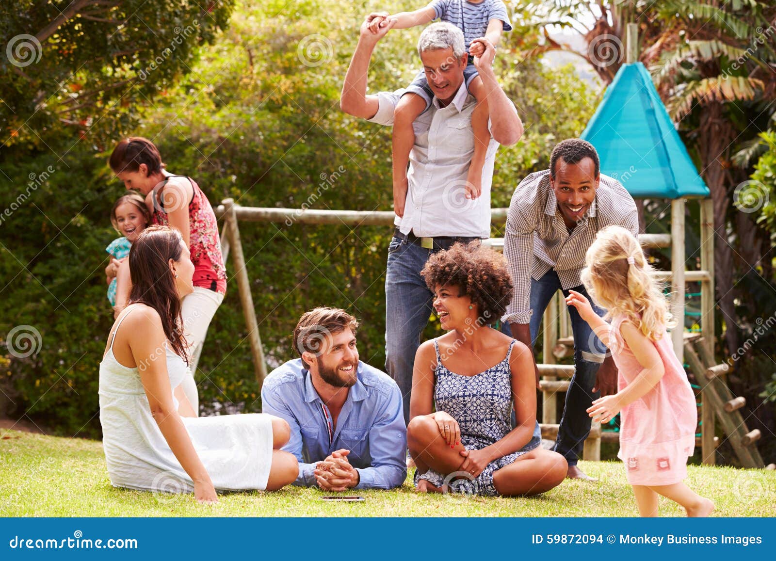 Adults and Kids Having Fun in a Garden Stock Photo - Image of full ...