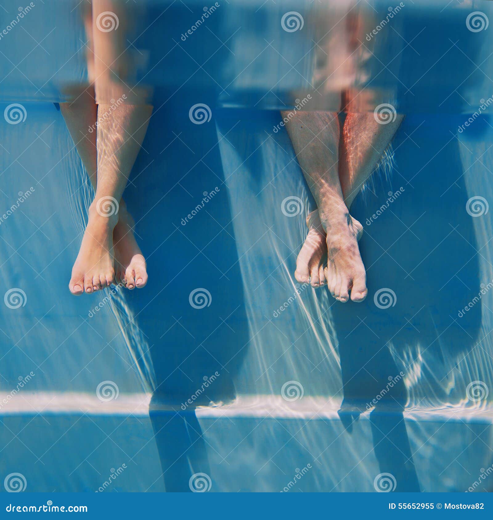 Adults Legs Underwater in the Swimming Pool Stock Image - Image of ...