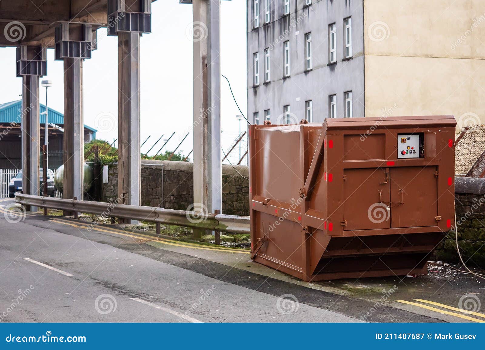 Advanced Electrical Powered Rubbish Trash Skip Bin In A Street. Brown ...