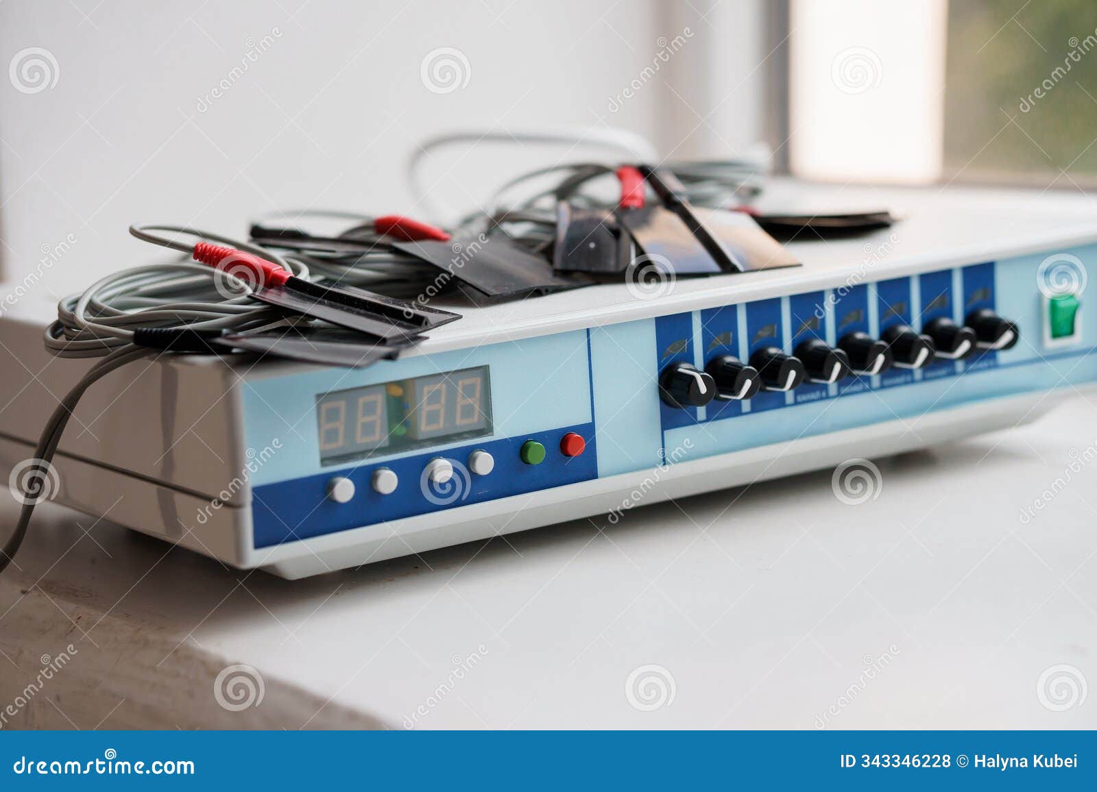 Advanced Electrotherapy Machine with Electrodes and Controls Stock ...