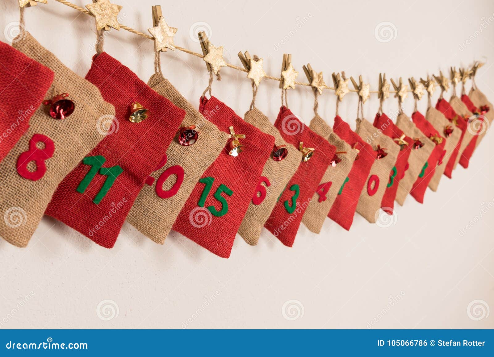 An Advent Calendar Made of Bags Hanging on a String Stock Photo - Image ...