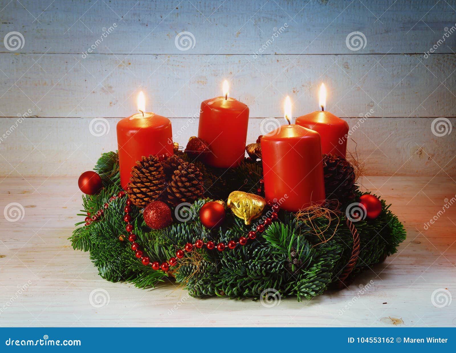Advent Wreath with Four Red Burning Candles and Christmas Decoration on ... Advent Wreath with Four Red Burning Candles and Christmas Decoration on ...