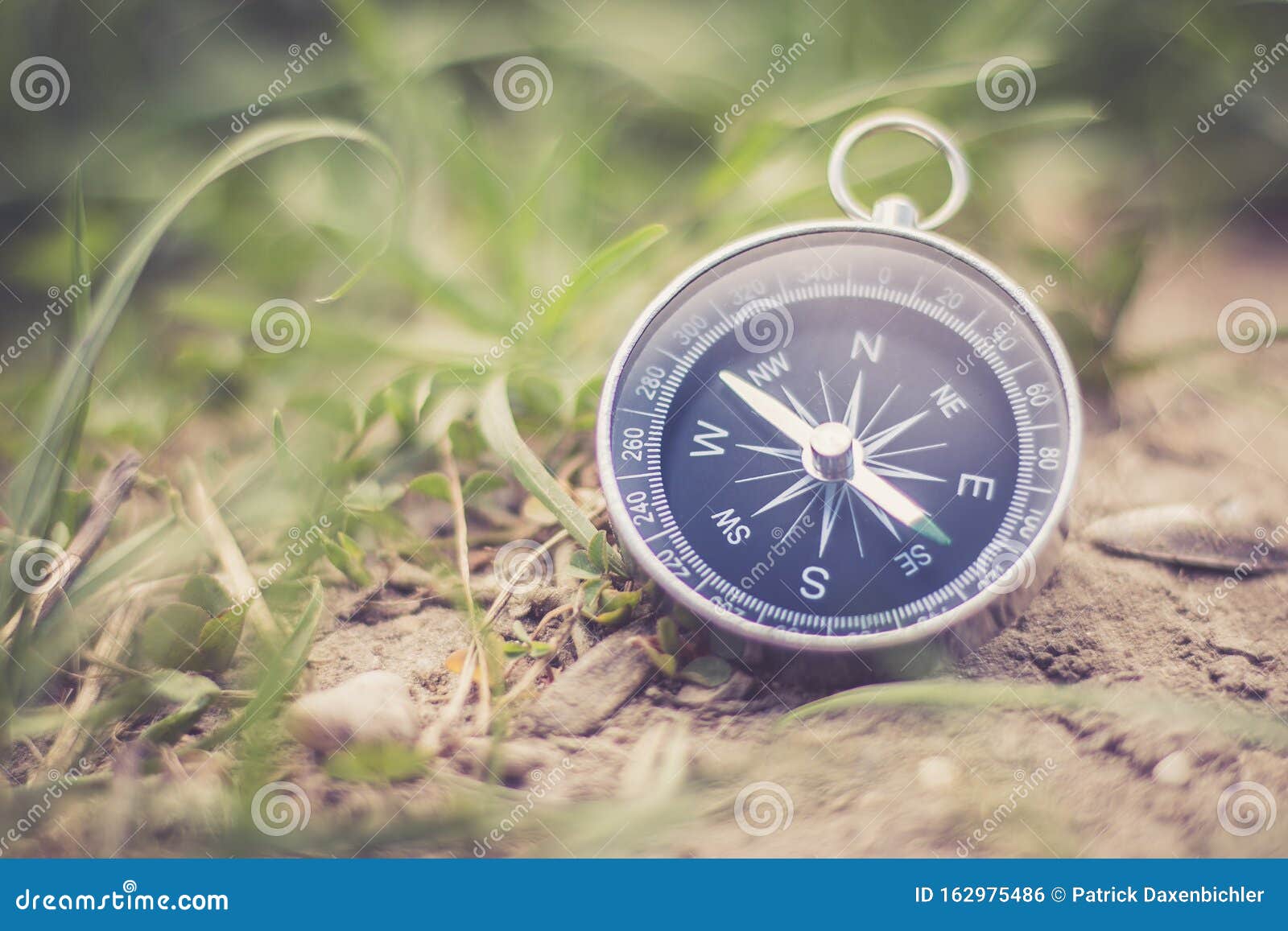 Adventure: Compass is Lying on the Floor, Showing the Direction Stock ...